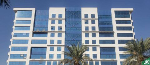 Indigo Optima Building International City Guide | Bayut